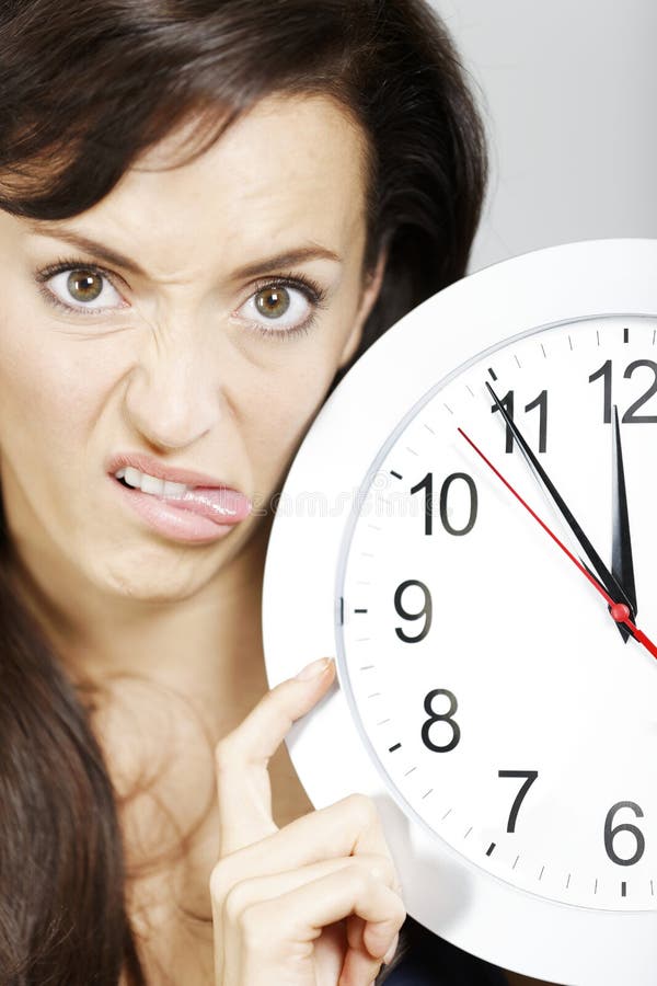 Woman with clock stock image. Image of late, beautiful - 39425785