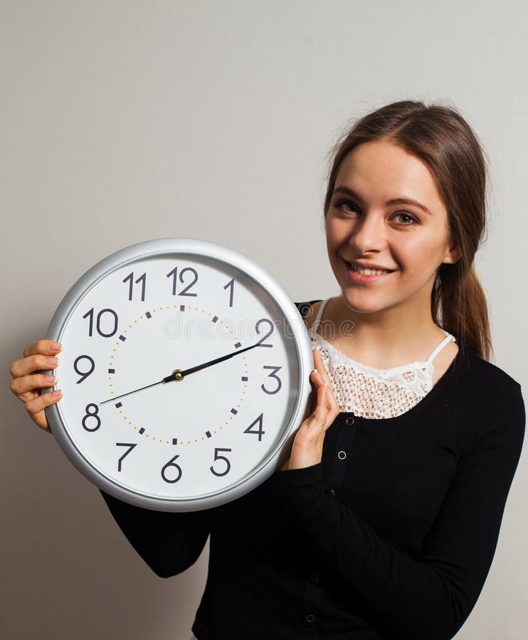 Woman with clock stock image. Image of female, time, business - 83018619