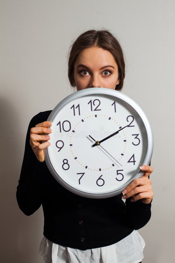 Woman with clock stock photo. Image of clock, beautiful - 11657724