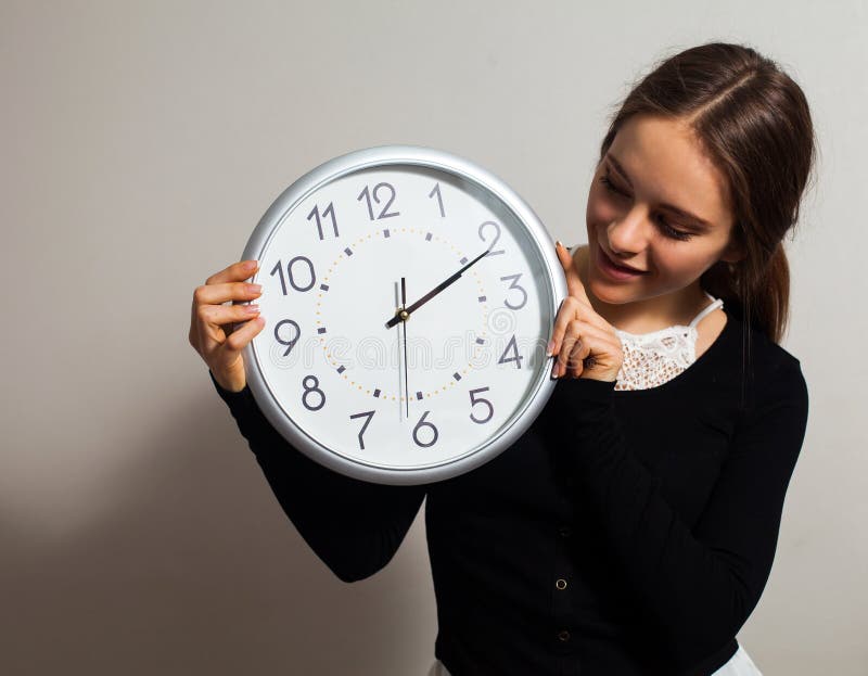 Woman with clock stock photo. Image of clock, beautiful - 11657724