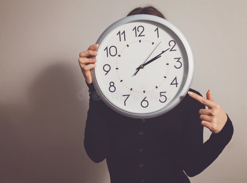 Woman with clock stock image. Image of deadline, worker - 83021887