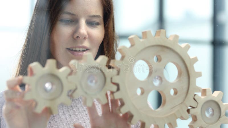 A Woman in Close-up in the Office is Thinking Over a Complex Business ...