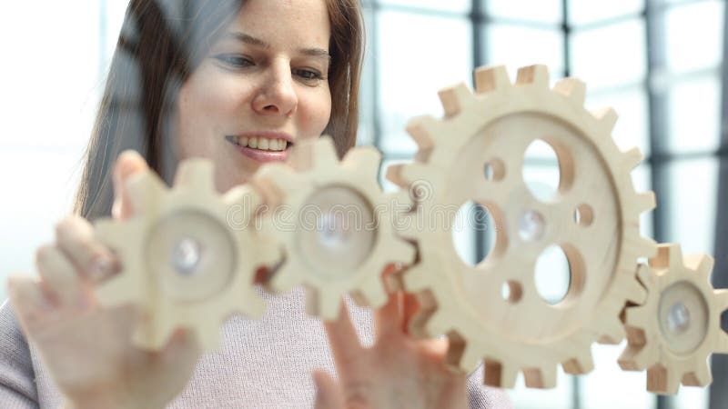 A Woman in Close-up in the Office is Thinking Over a Complex Business ...