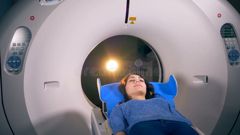 A Woman with Closed Eyes Prepares for a CT Scan. Stock Video - Video of ...
