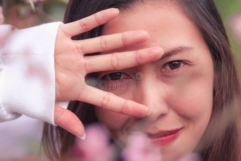 The Woman Closed One Eye with Her Hand. Stock Image - Image of looking ...