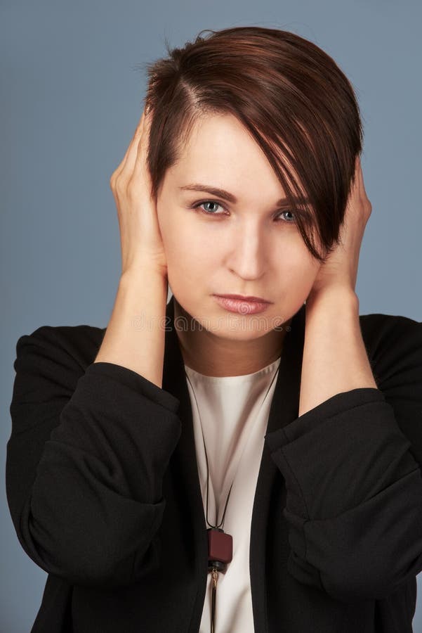 Woman closing ears stock image. Image of dissatisfaction - 121428845