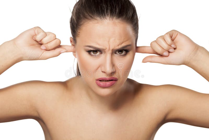 Woman closing ears stock image. Image of person, noise - 65252053