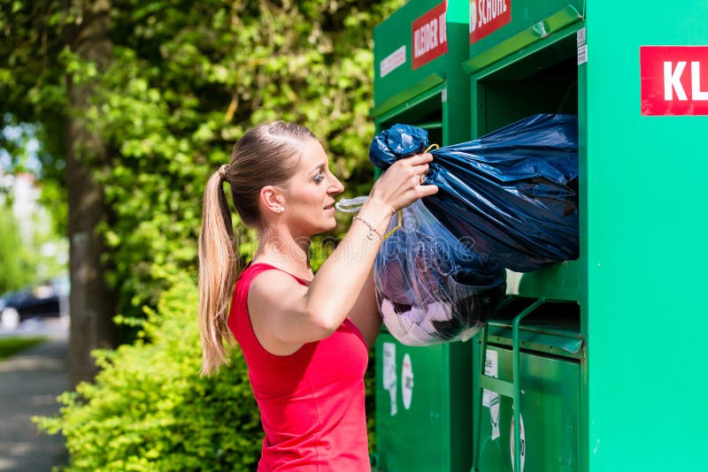 Woman at Clothes Recycling Skip Stock Photo - Image of skip, people ...