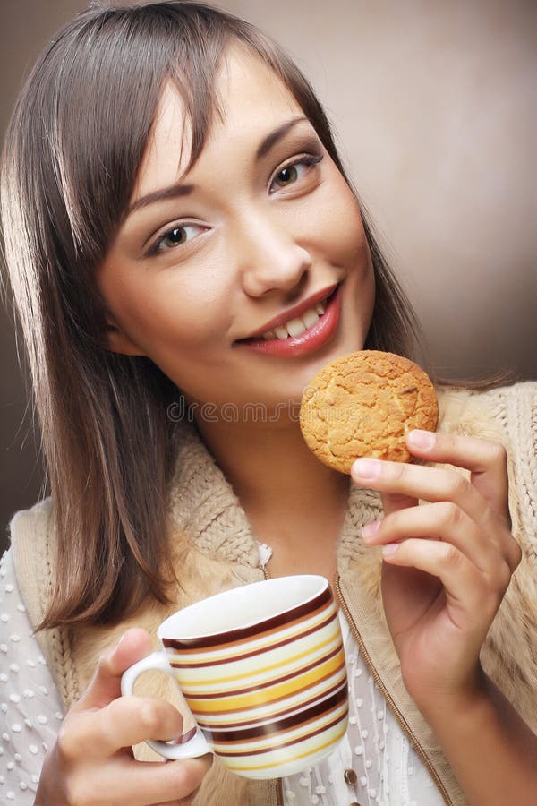 Cookie woman stock photo. Image of delicious, eating - 15829274