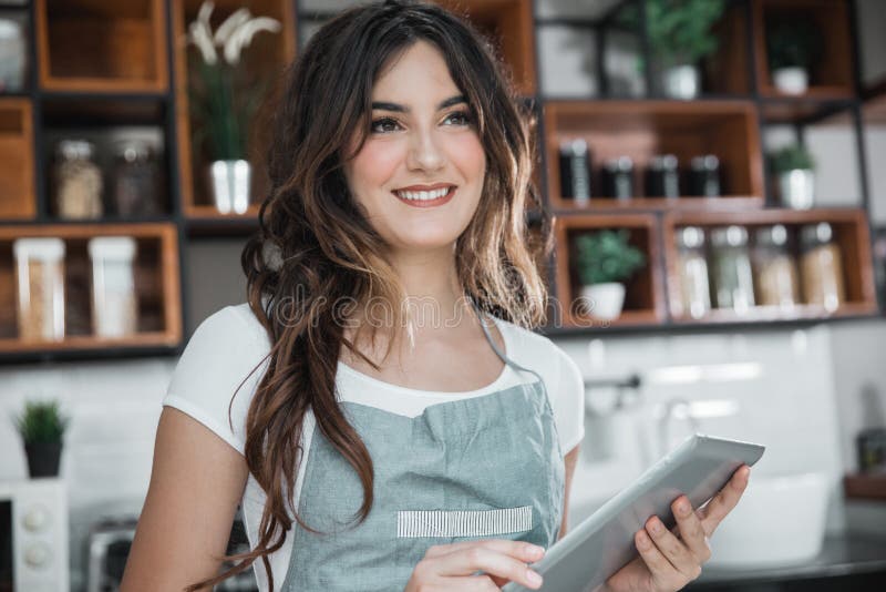 Woman Coffee Shop Worker Using Tablet Pc Stock Image - Image of home ...