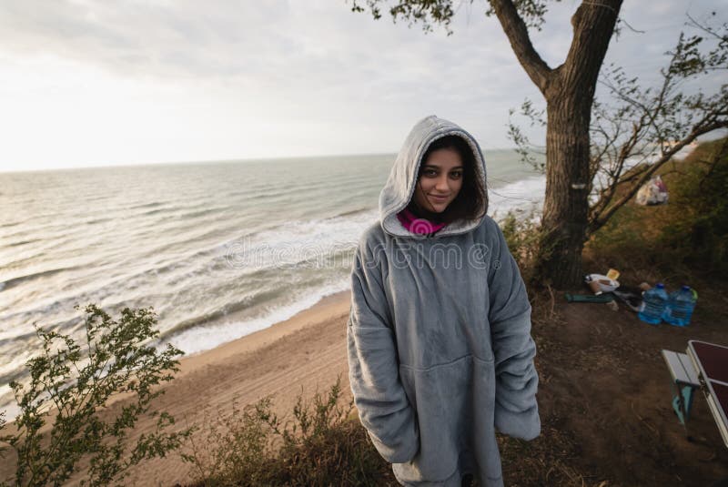 Young Woman on Cold Autumn Seashore Posing at Camera Stock Image ...