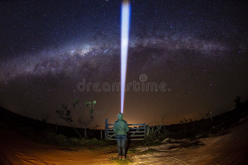 Woman with Cold Clothes Lighting the Sky - Milk Way. Stock Image ...