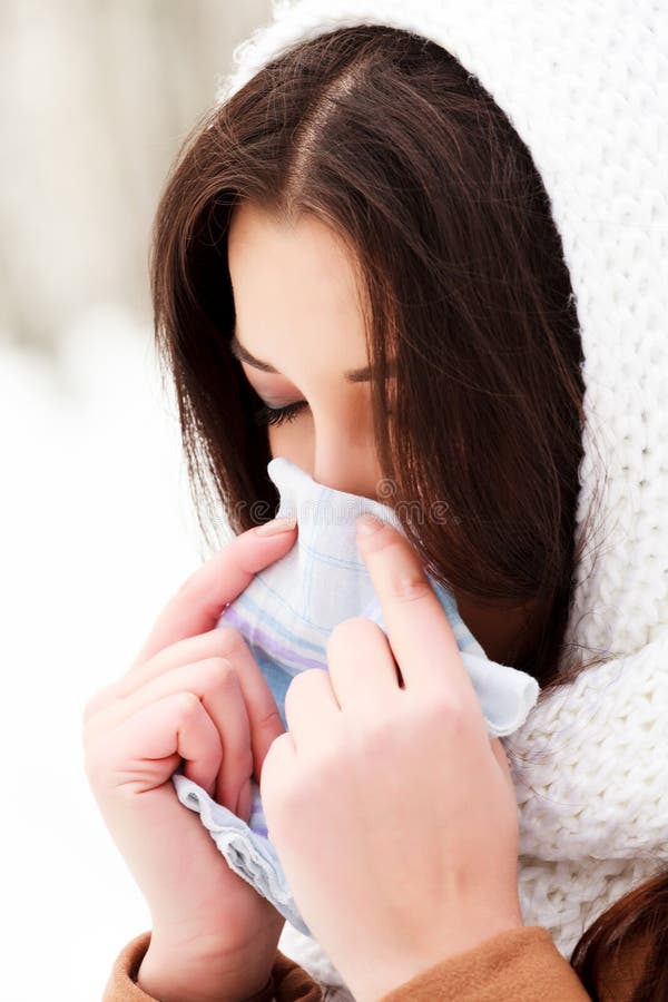 Woman with a Cold Holding a Tissue Stock Photo - Image of pain, scarf ...