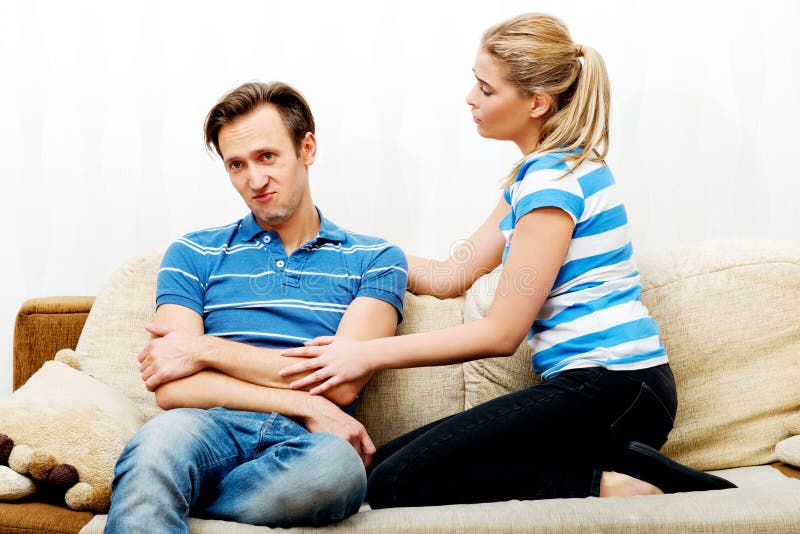 Woman Comforting Her Sad Husband Stock Image - Image of couch, grieve ...