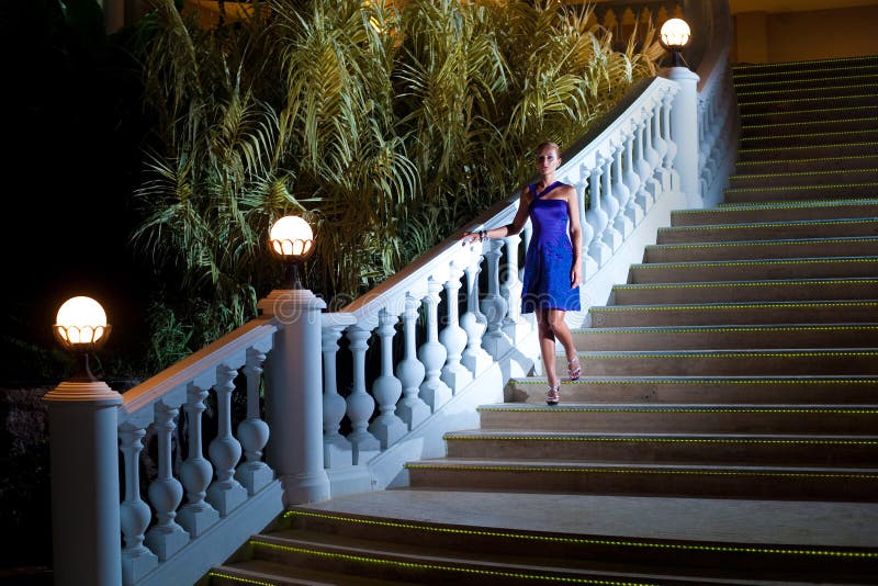 Woman coming downstairs stock image. Image of sensuality - 25799309