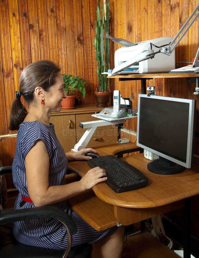 Woman at computer stock photo. Image of comfortable, happiness - 25505034