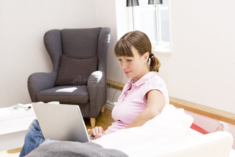 Woman with computer stock image. Image of blue, laptop - 27182359