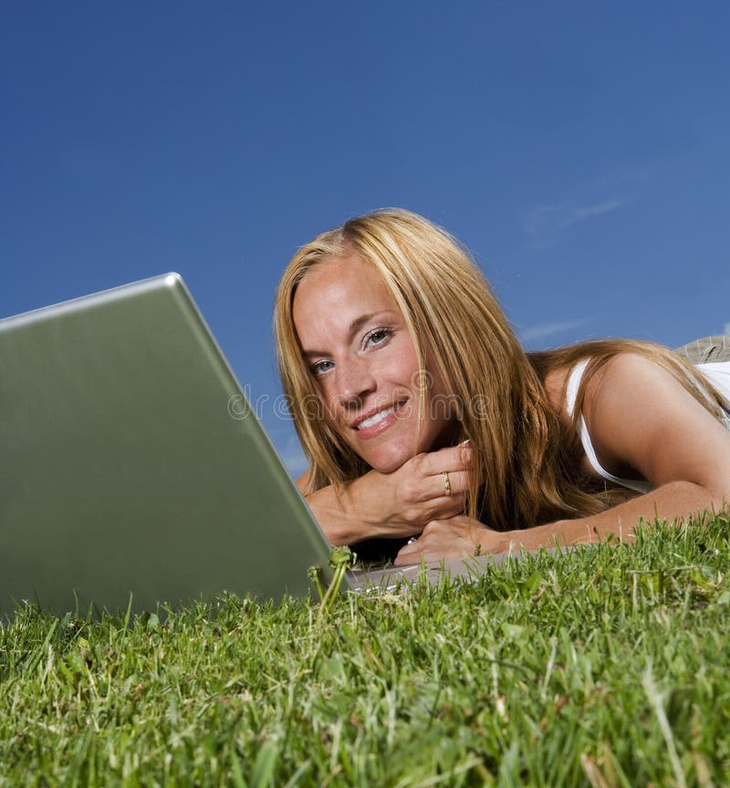 Woman with computer stock image. Image of blue, laptop - 27182359