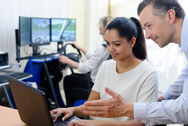 Woman on Computer while Learning To Drive Stock Image - Image of teach ...