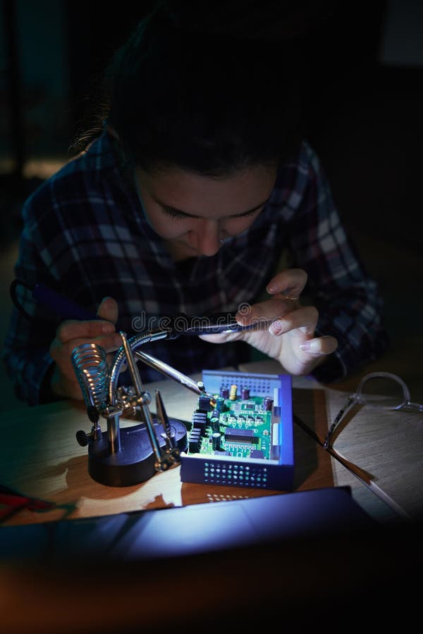 Woman, Computer Motherboard and Night with Soldering Iron ...