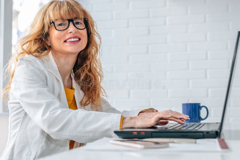Woman with Computer in Office Stock Photo - Image of working, adults ...