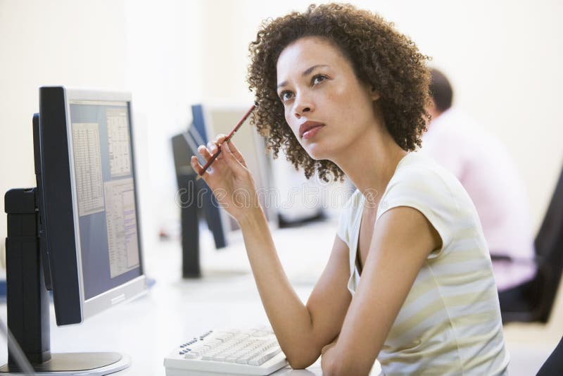Woman in Computer Room Thinking Stock Photo - Image of ideas, moment ...