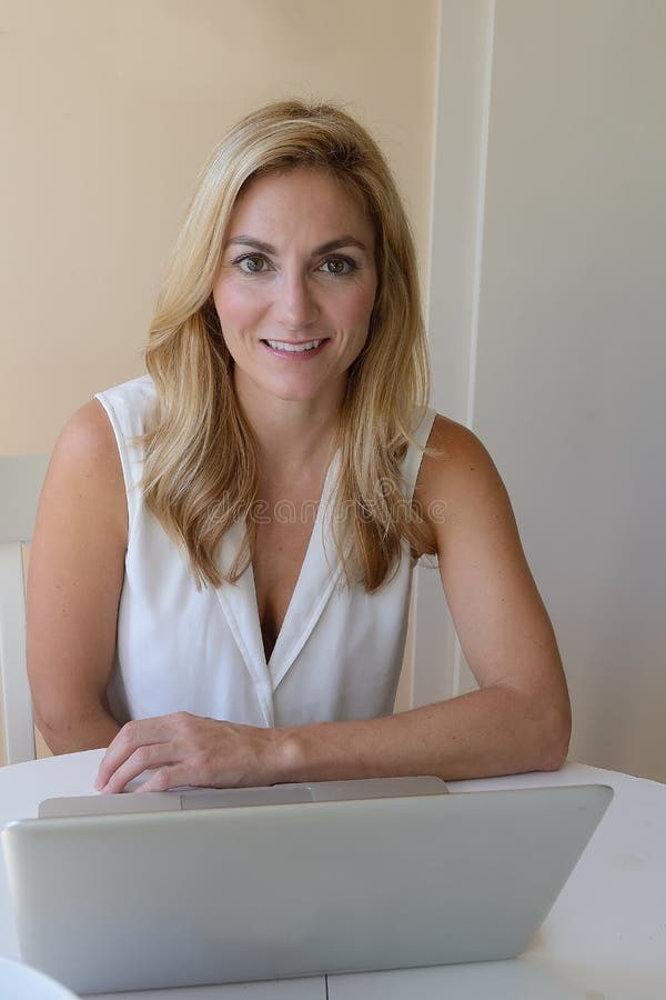 Woman on Computer stock image. Image of smiling, wireless - 47789647