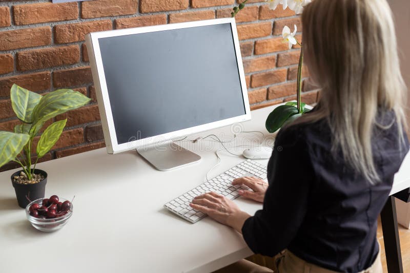 A Woman with a Computer Working from Home Stock Image - Image of ...