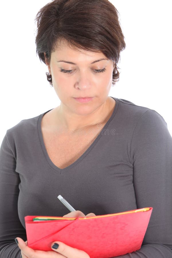 Woman Concentrating Writing Notes Stock Image - Image of folder ...
