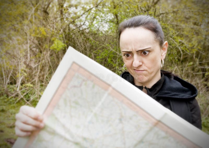 Woman Confused Looking at Map Stock Photo - Image of hand, exploration ...