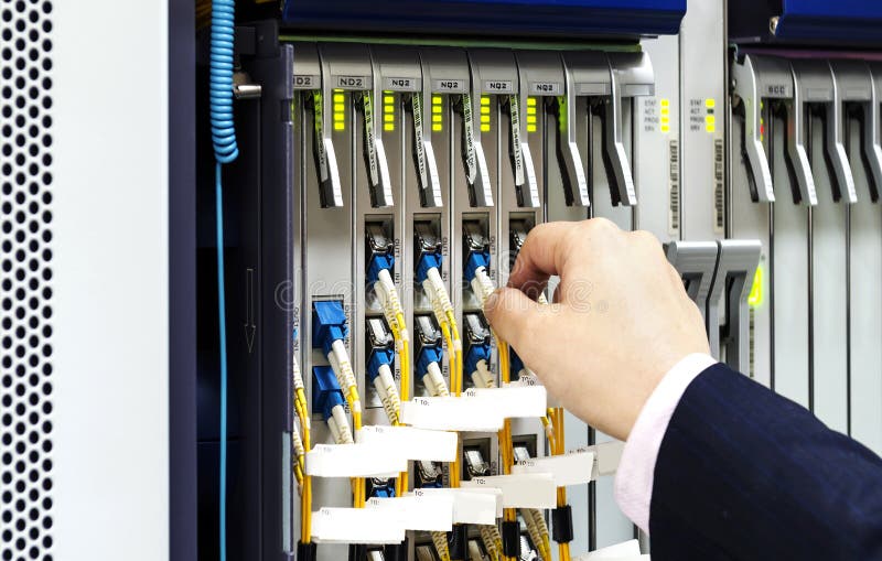 Woman Connecting Network Cables To Switches Stock Image - Image of ...