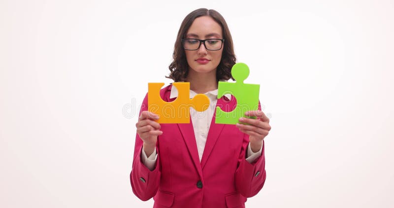 Woman Connects Puzzle Pieces Representing Problem Solving Stock Footage ...