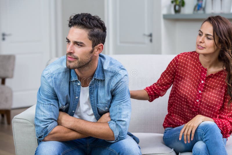 Woman Consoling Man after Argument Stock Photo - Image of life ...