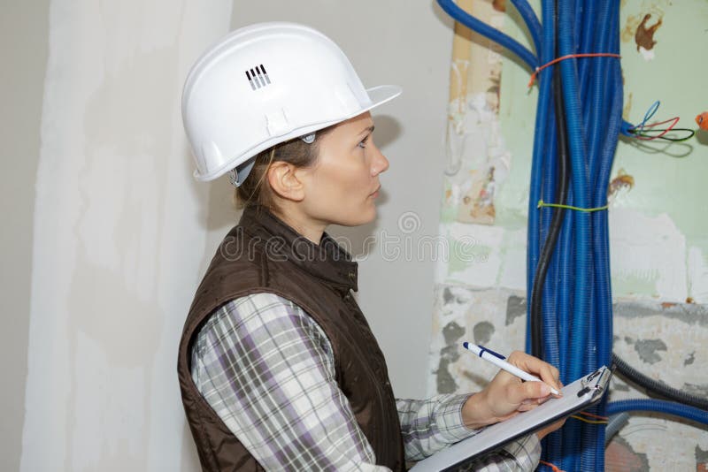 Woman Construction Worker Checking Progress at Site Stock Photo - Image ...