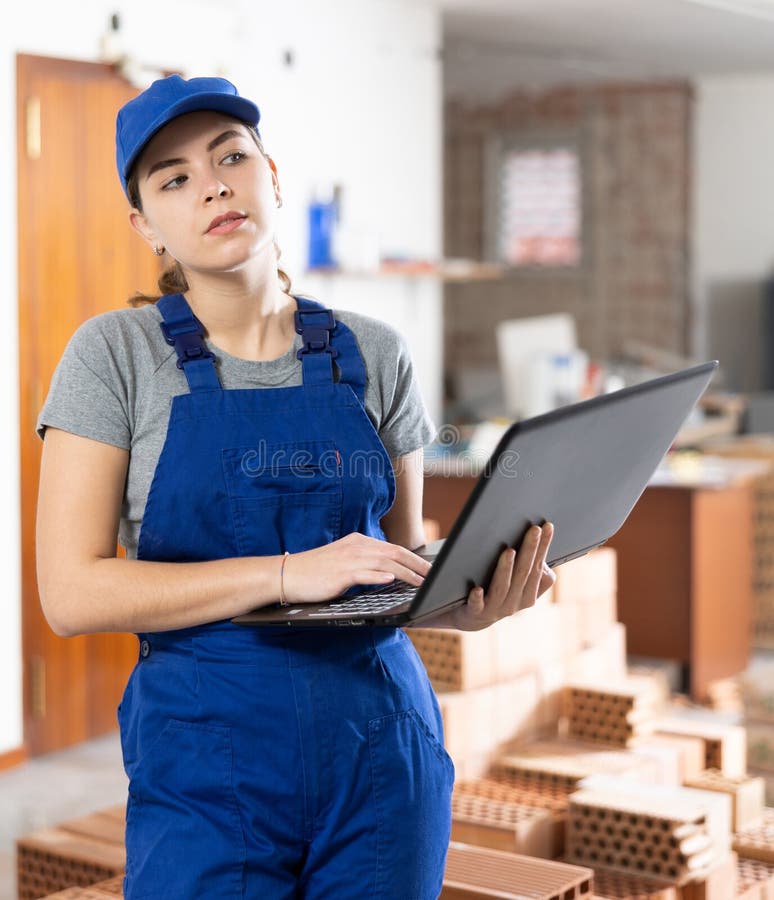 Woman Construction Worker Using Laptop in Apartment Stock Image - Image ...