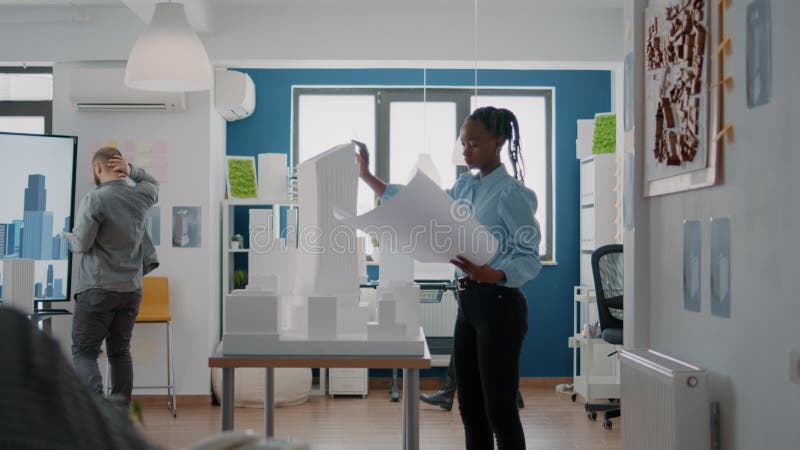Woman Constructor Designing Building Model with Architectural ...