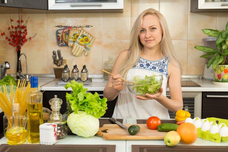 Woman Coocking Salad at the Kitchen Table Stock Image - Image of pretty ...