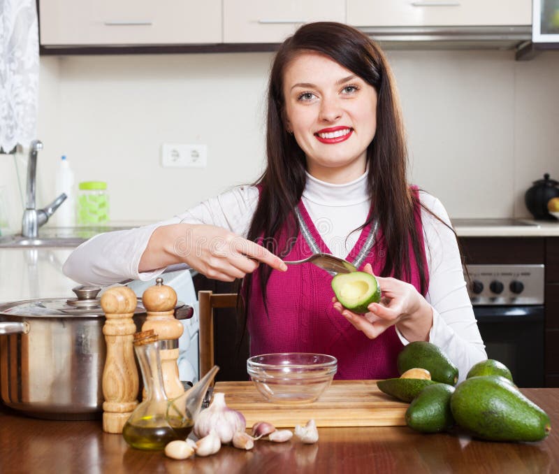 Woman cooking with avocado stock photo. Image of aguacate - 41638214
