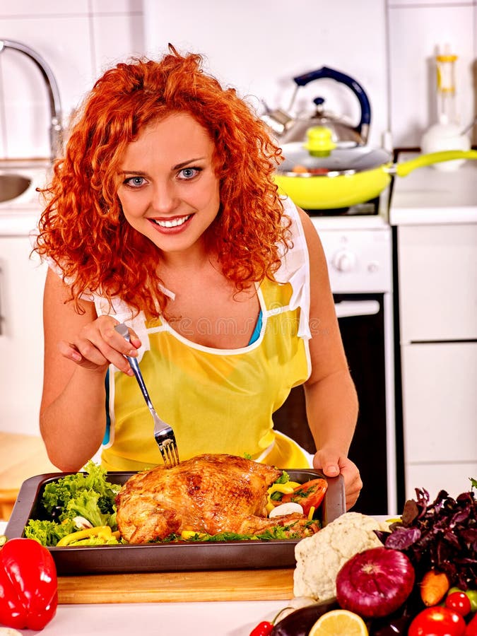Woman Cooking Chicken at Kitchen Stock Image - Image of interior, apron ...