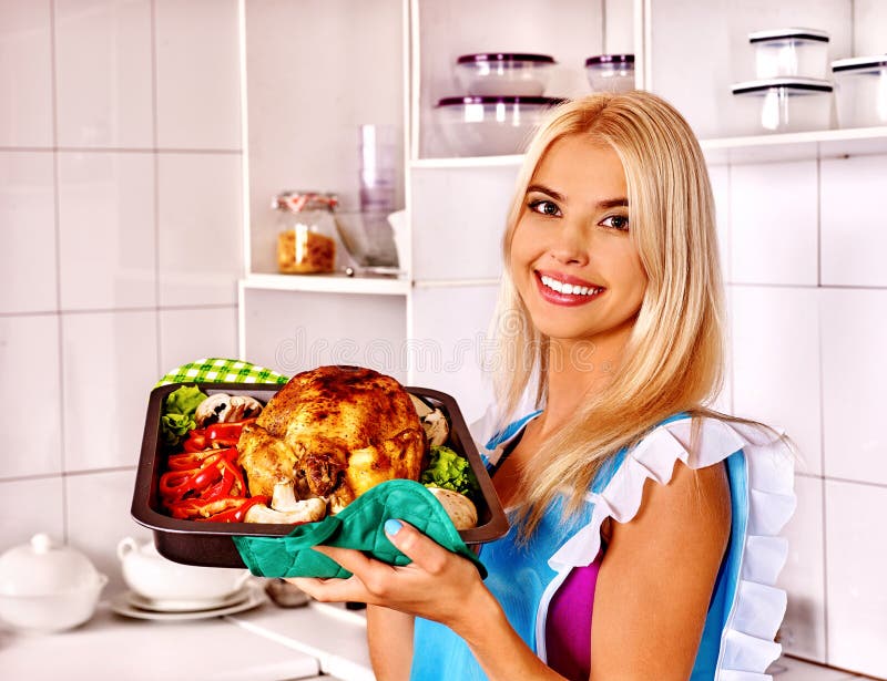 Woman Cooking Chicken at Kitchen Stock Photo - Image of poultry ...