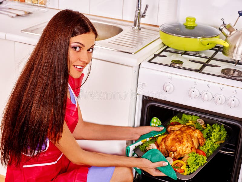 Woman Cooking Chicken at Kitchen Stock Photo - Image of roast, poultry ...