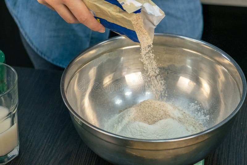 Woman cooking with flour stock image. Image of preparation - 218756613