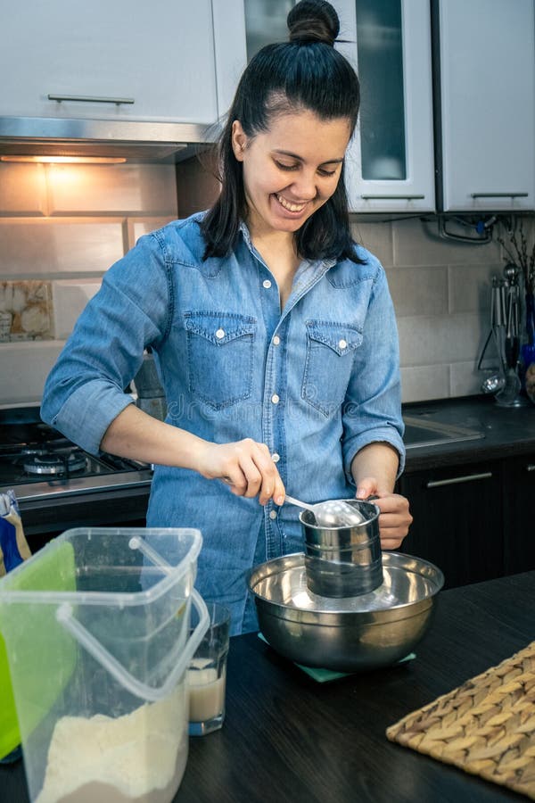 Woman cooking with flour stock photo. Image of cookery - 219024084