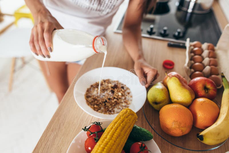 Woman Cooking Food Breakfast in the Kitchen. Stock Photo - Image of ...
