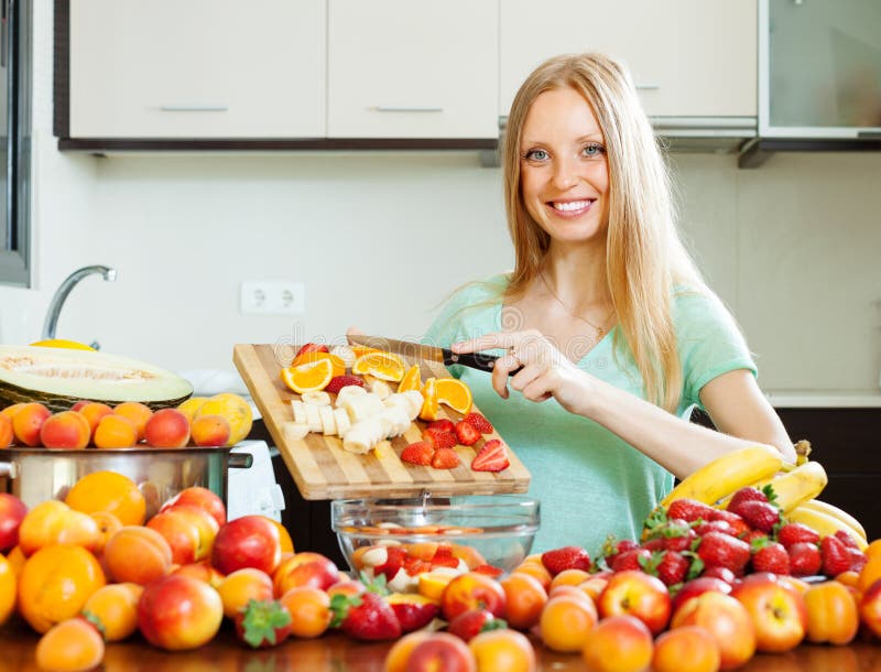 Woman cooking fruit salad stock photo. Image of healthy - 35109500