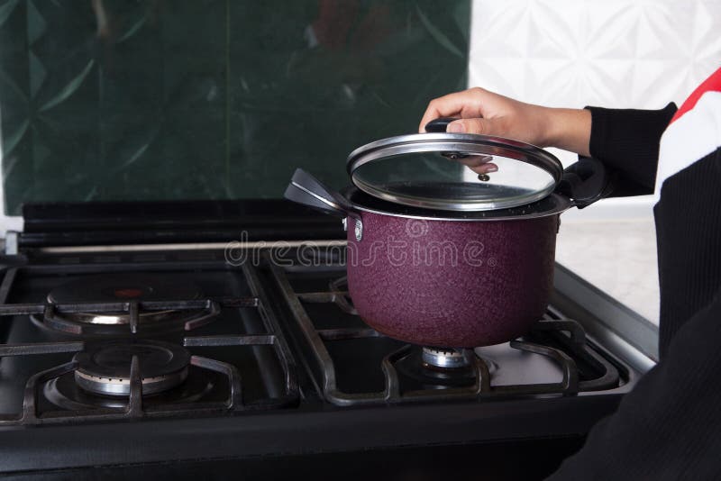 Woman is Cooking on the Gas in the Kitchen Stock Photo - Image of stove ...