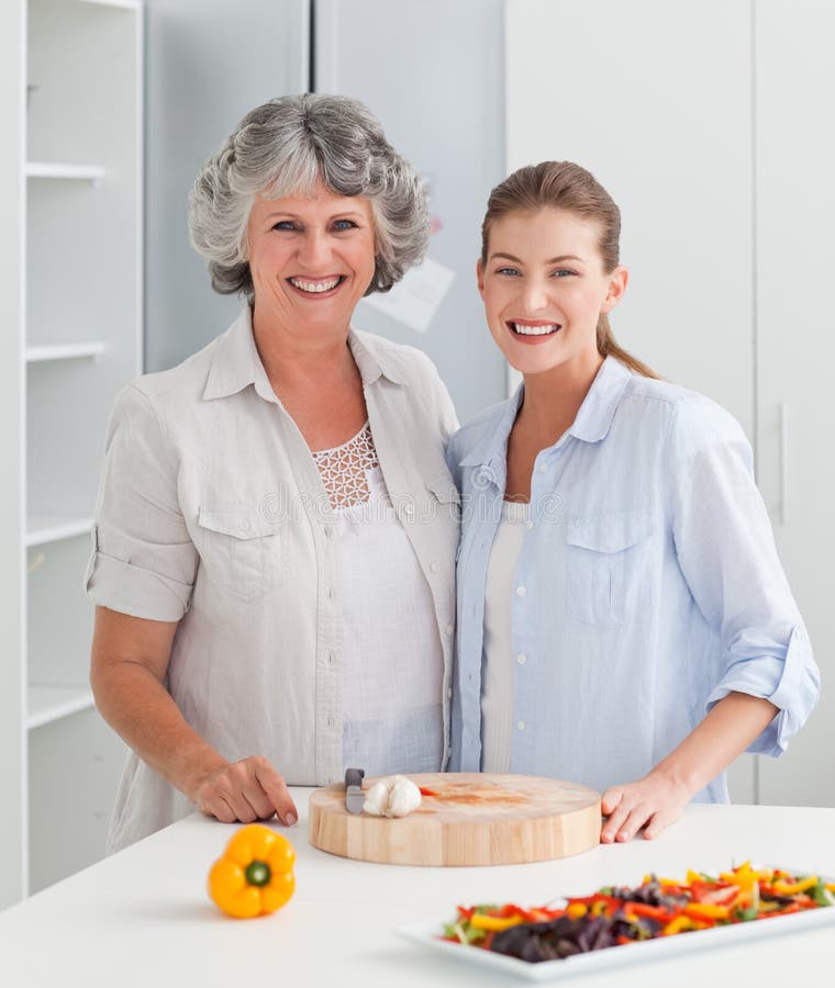 Woman Cooking with Her Mother Stock Image - Image of home, caucasian ...
