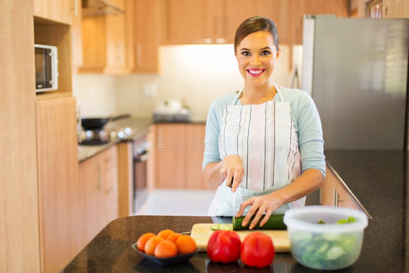 Woman cooking home stock image. Image of happy, home - 64149167