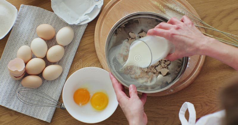 A Woman Cooking at Home, Enjoying Hobby. Making Bread at Home. Bread ...