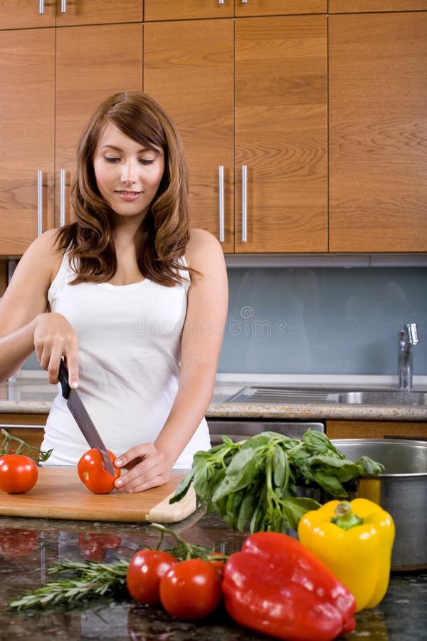 Young Woman Cooking stock photo. Image of romantic, healthy - 27697836